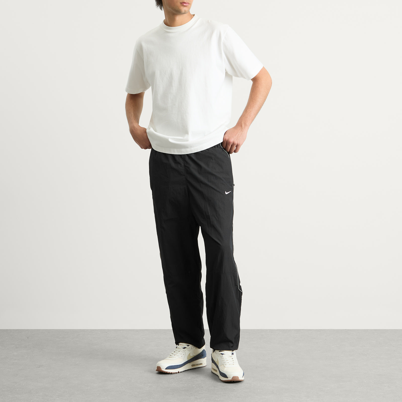 Nike Solo Swoosh Woven Track Pant - Black/White | Editorialist