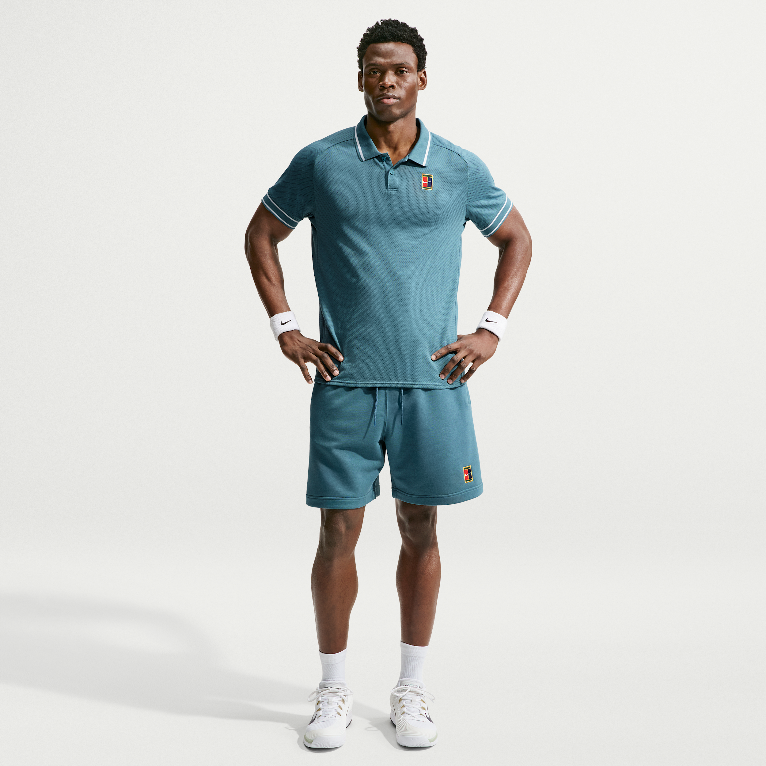 NIKE men's court heritage tennis polo