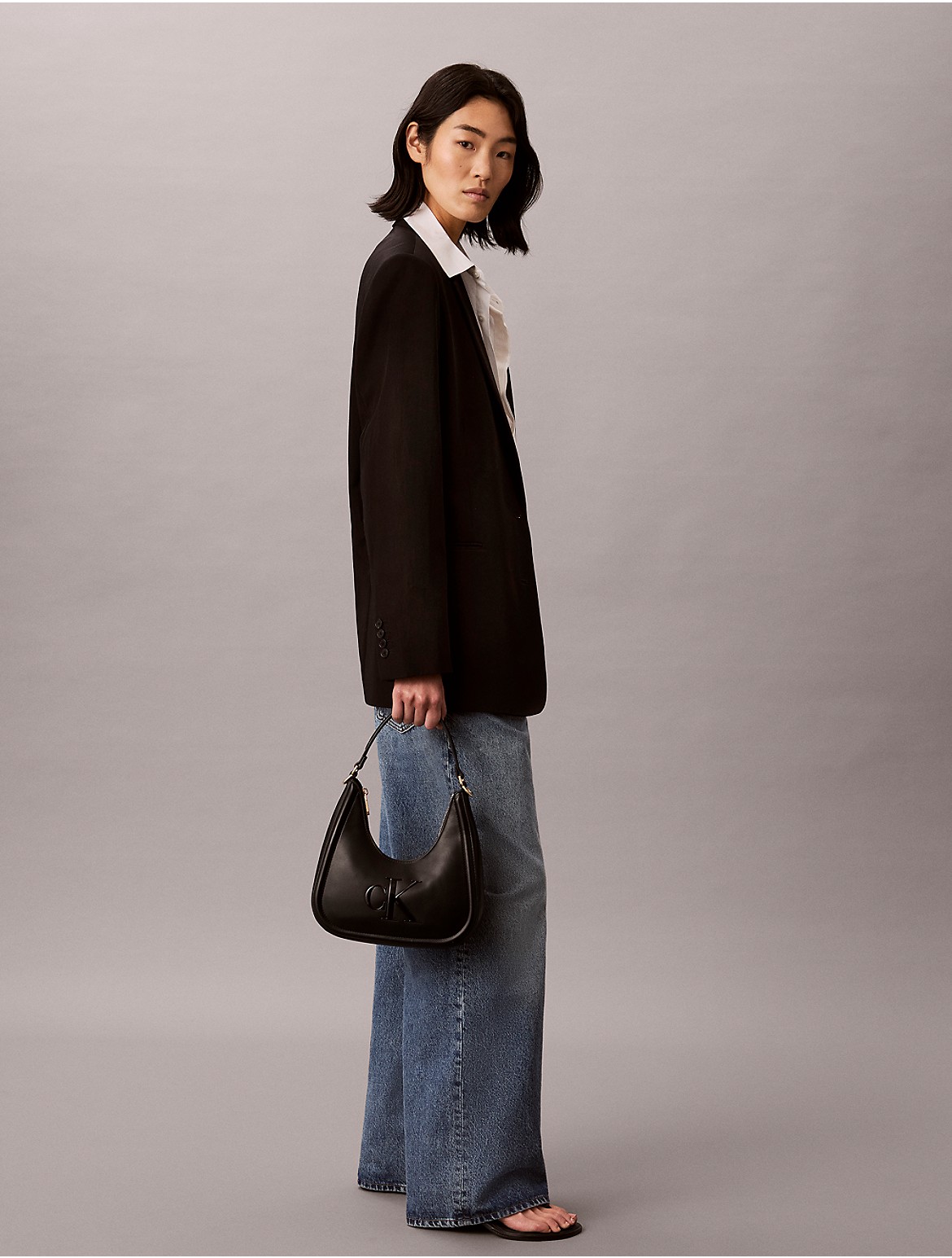 CALVIN KLEIN Calvin Klein Embossed Monogram Crescent Bag