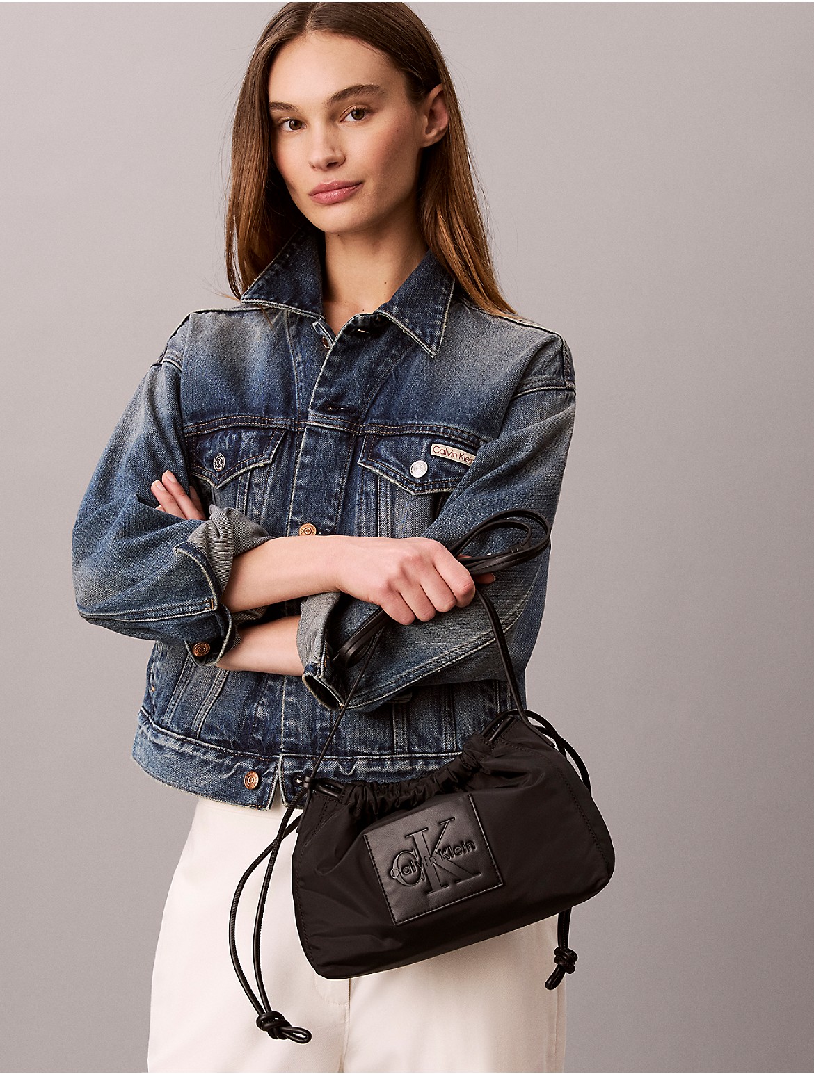 CALVIN KLEIN Calvin Klein Nylon Monologo Crossbody Bag with Drawstring Closure