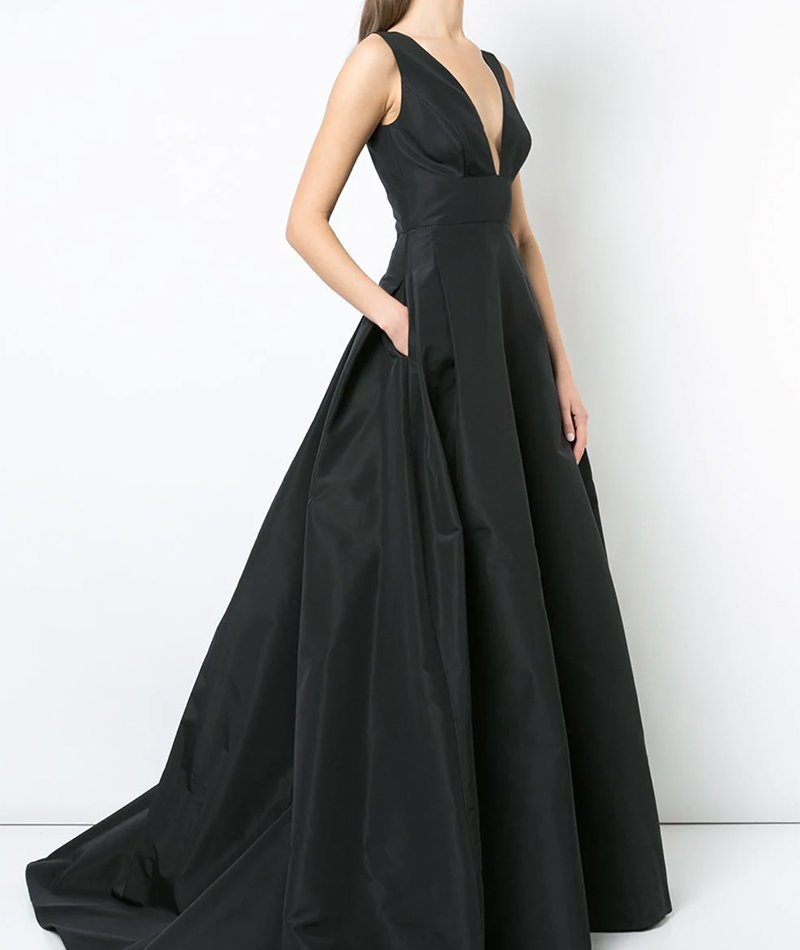 Gala Dressing_0002_5b CAROLINA HERRERA deep V-neck flared gown $4,990