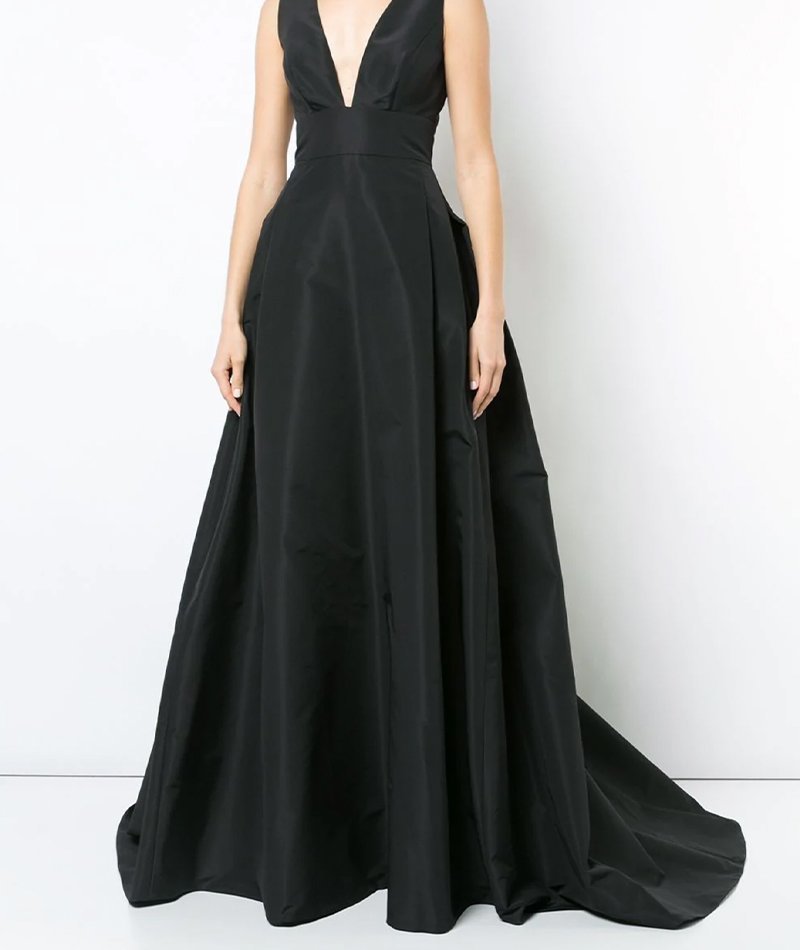 Gala Dressing_0003_5a CAROLINA HERRERA deep V-neck flared gown $4,990