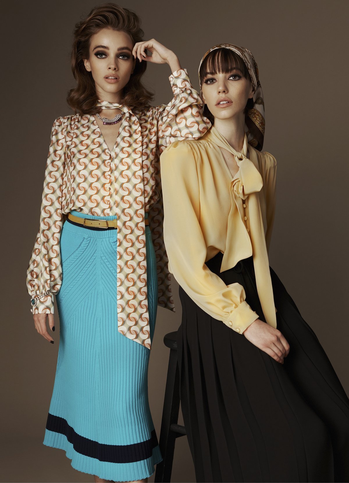 Olivia Palermo's Fashion Collection_Printed Pussybow Blouse Tucked into Blue Skirt Yellow Pussybow Blouse Tucked into Black Skirt