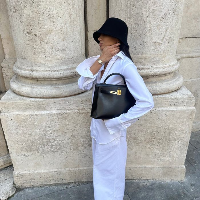 This Is How Fashion Insiders Are Wearing Oversized Shirts Now