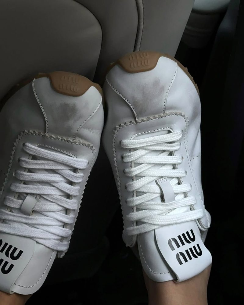 Miu Miu white leather sneakers with logo tongue and gum sole%2C chic spring sneakers styled casually