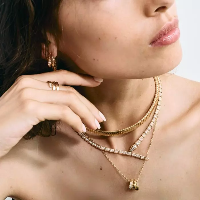 Our Editors Are Obsessed With Layering Statement Necklaces With Easy Summer Tops