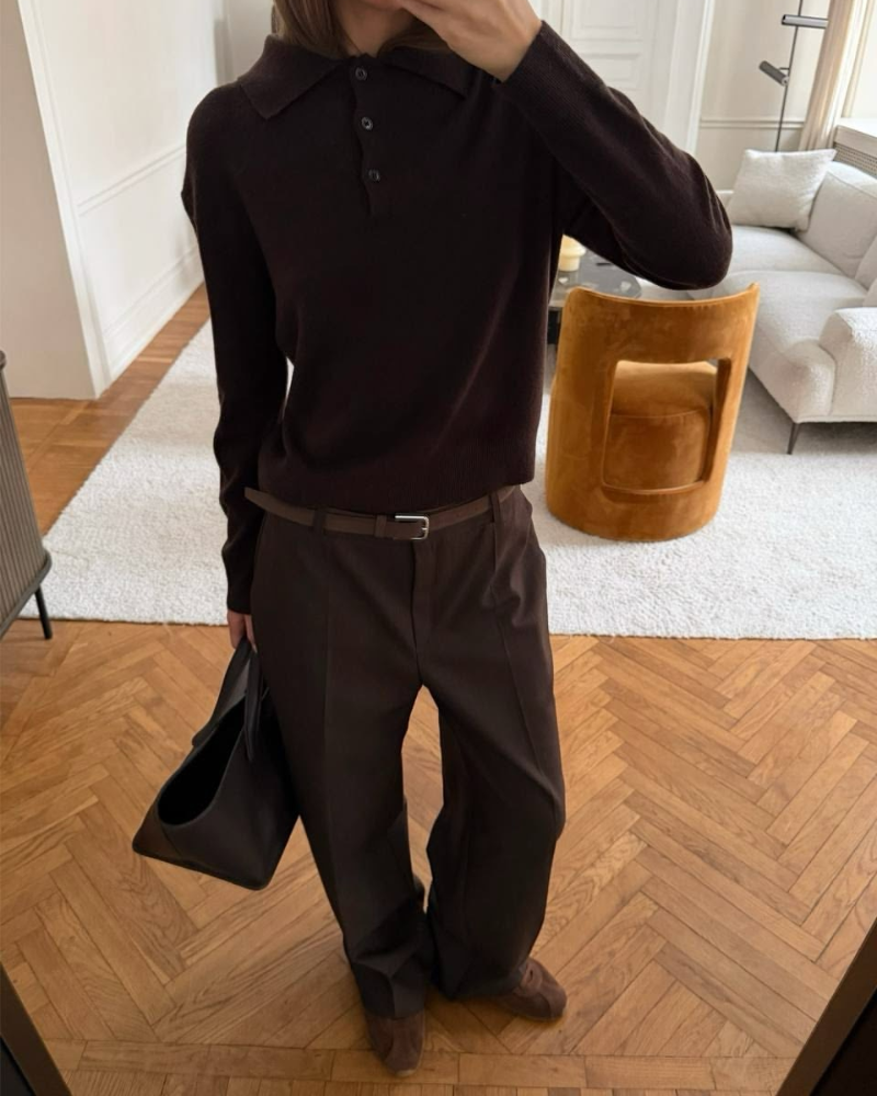Chic brown sweater featuring a classic polo collar%2C paired with tailored brown wide-leg trousers and a sleek black handbag