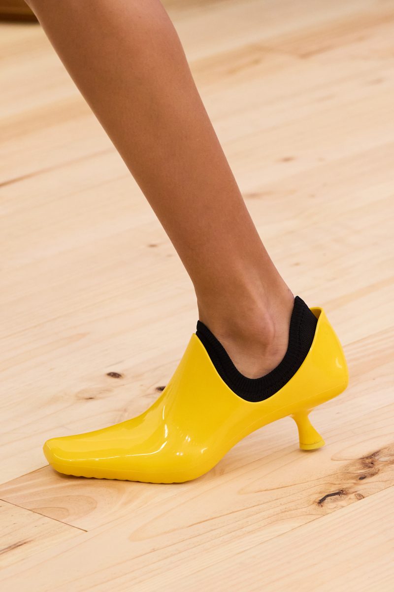 Yellow glossy leather kitten heel shoe with black sock detail from Loewe spring summer 2026 collection