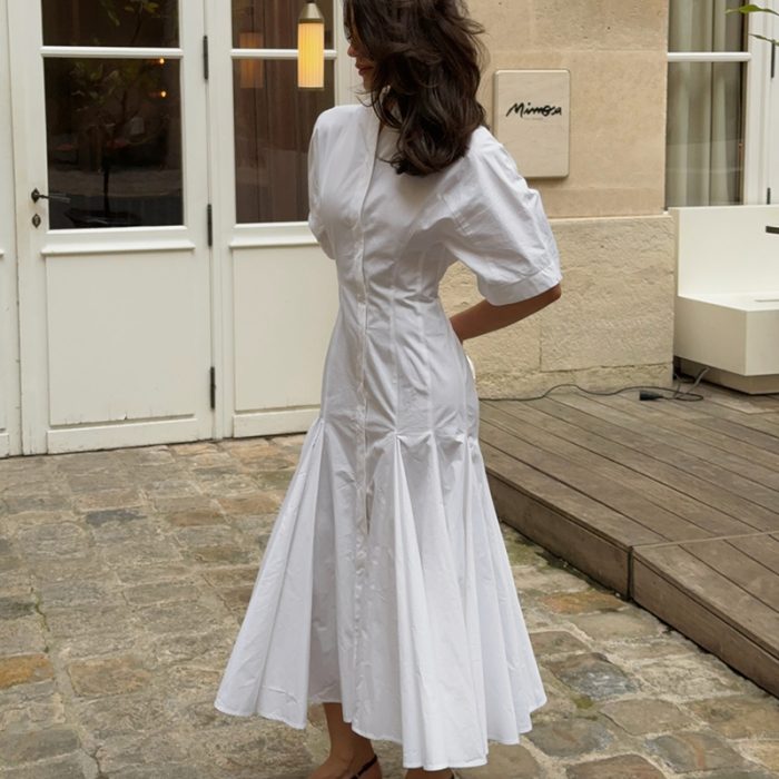 The 18 Editor-Approved Summer Midi Dresses We’re Wearing Everywhere
