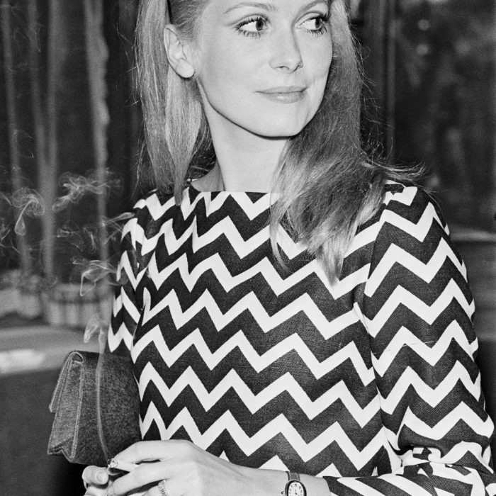 Catherine Deneuve’s Outfits Are a Masterclass in French Style—Here’s How to Get the Look This Fall