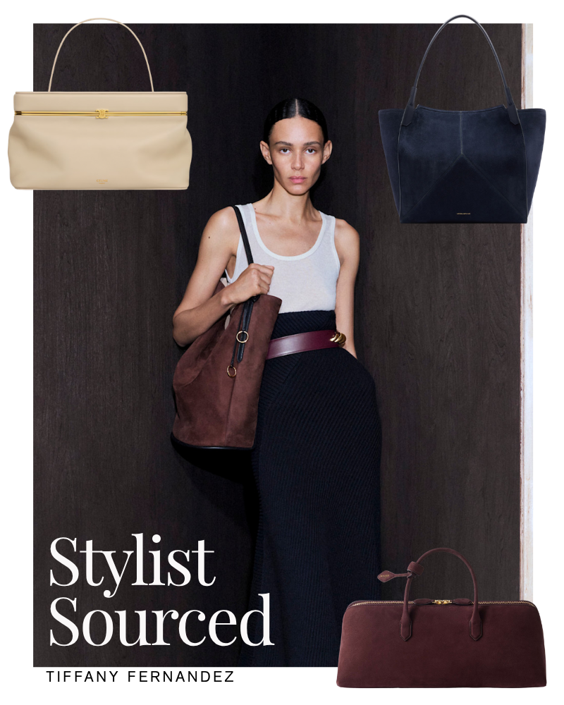 Model carries a brown suede tote with white tank and black skirt%2C framed by neutral luxury handbags